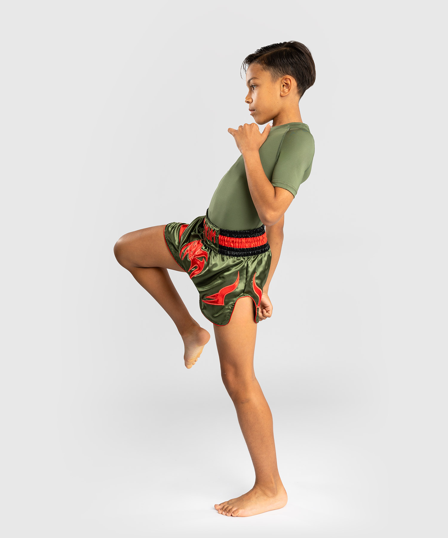 Venum Inferno Kids Muay Thai Shorts Army Green Orange - Fightwear Shop ...