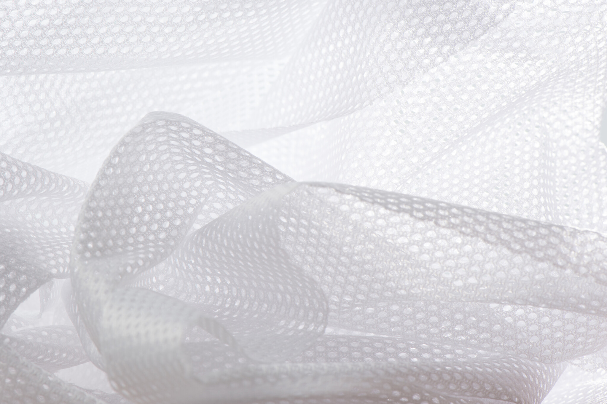 Ontdek de Veelzijdigheid van Onze Lichte en Ademende Mesh Stof ...