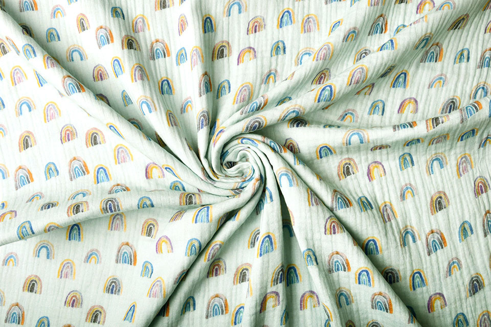 Baumwoll Musselin Stoff Regenbogen Hell Blau-Grün - Boelens Modestoffen