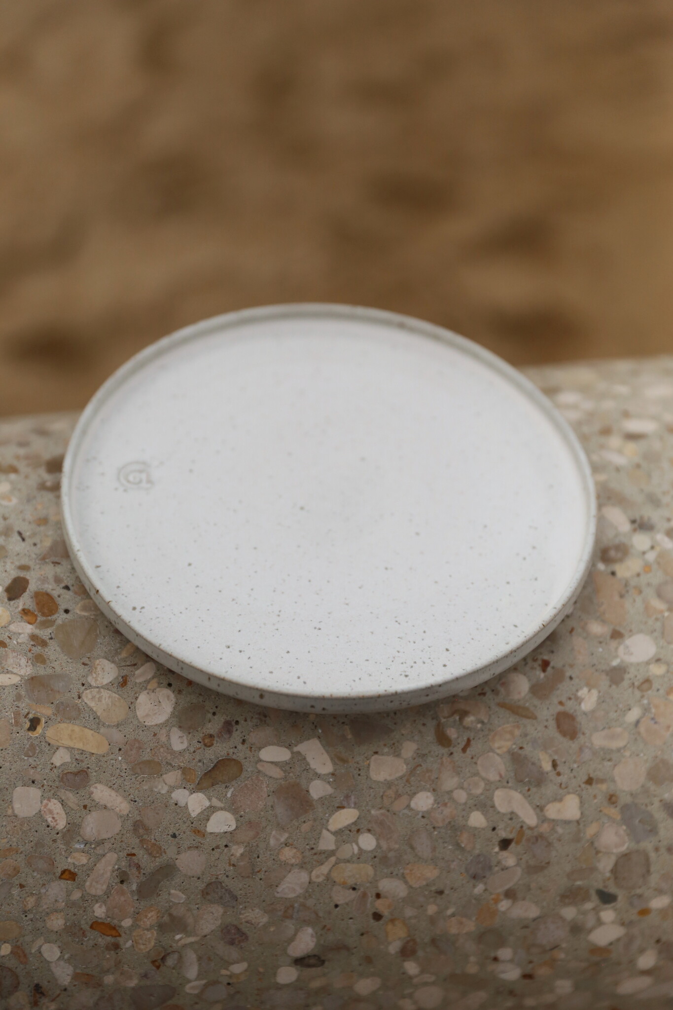 Handmade white ceramic plate from the tableware “White Spots" - ARTISANN