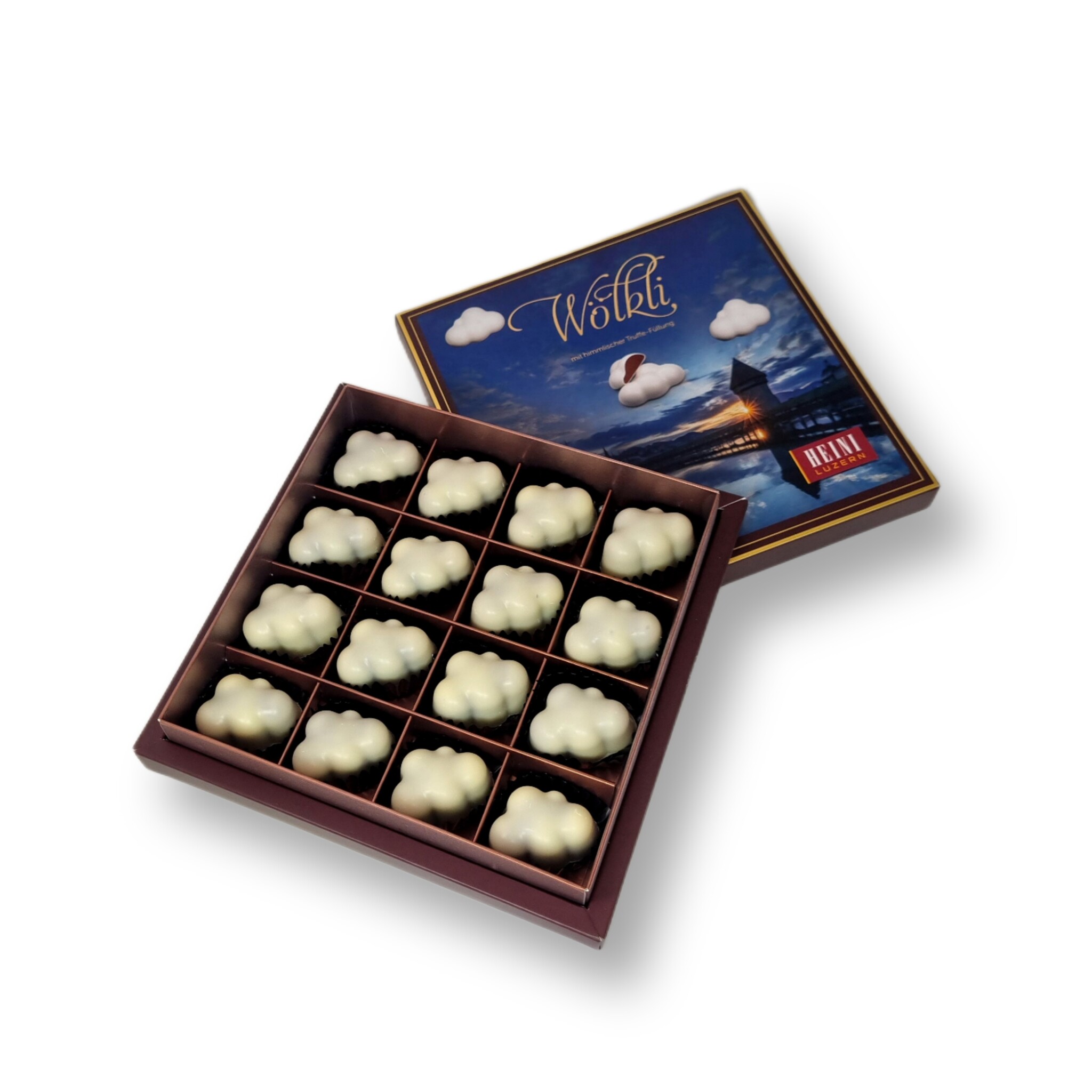 Wölkli mit himmlischer Truffe-Füllung - HEINI Luzern Wölkli mit himmlischer Truffe-Füllung - HEINI Luzern