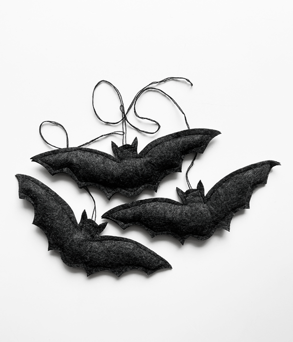 Set of 10 soft-filled wool felt bat ornaments in seasonal Halloween co ...
