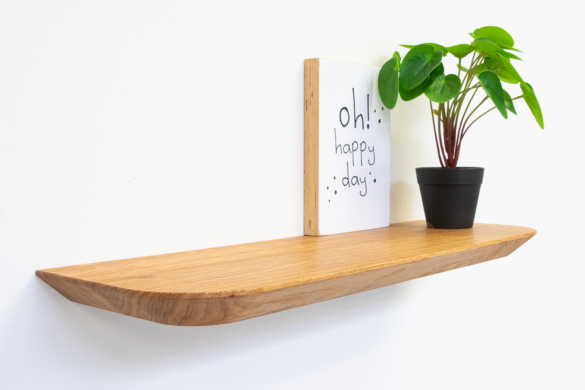 Zwevende wandplank facet transparant geolied