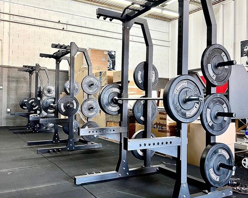 Half rack versus full rack (power rack) - Fitnesskoerier.nl