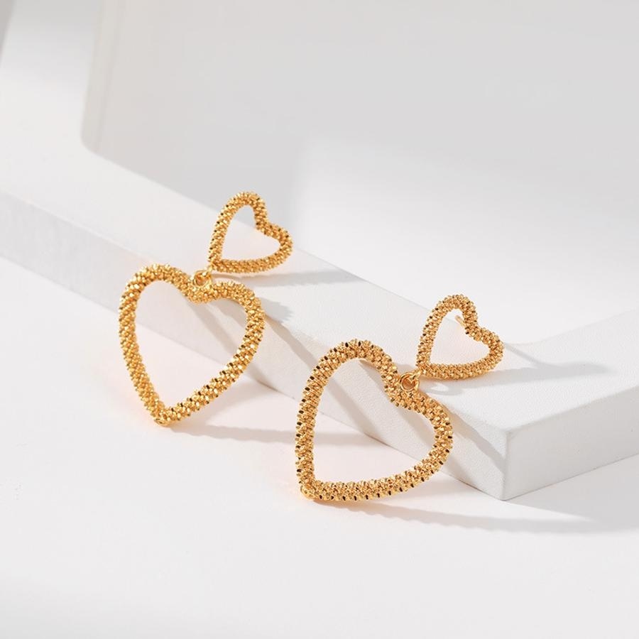 Gouden Hartjes Oorhangers - Uwantisell.nl