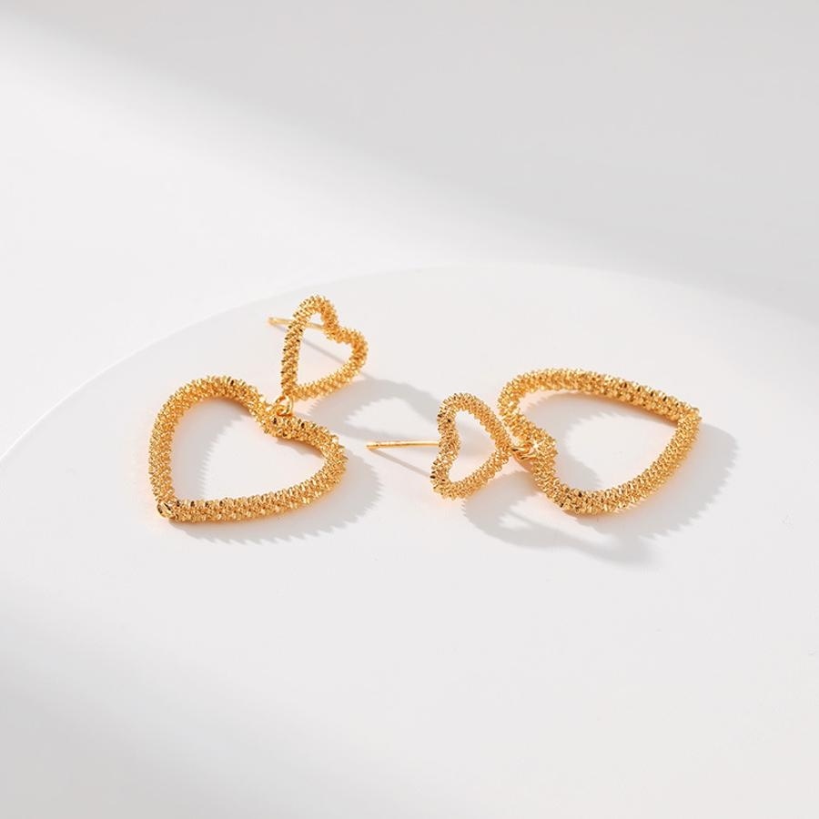 Gouden Hartjes Oorhangers - Uwantisell.nl